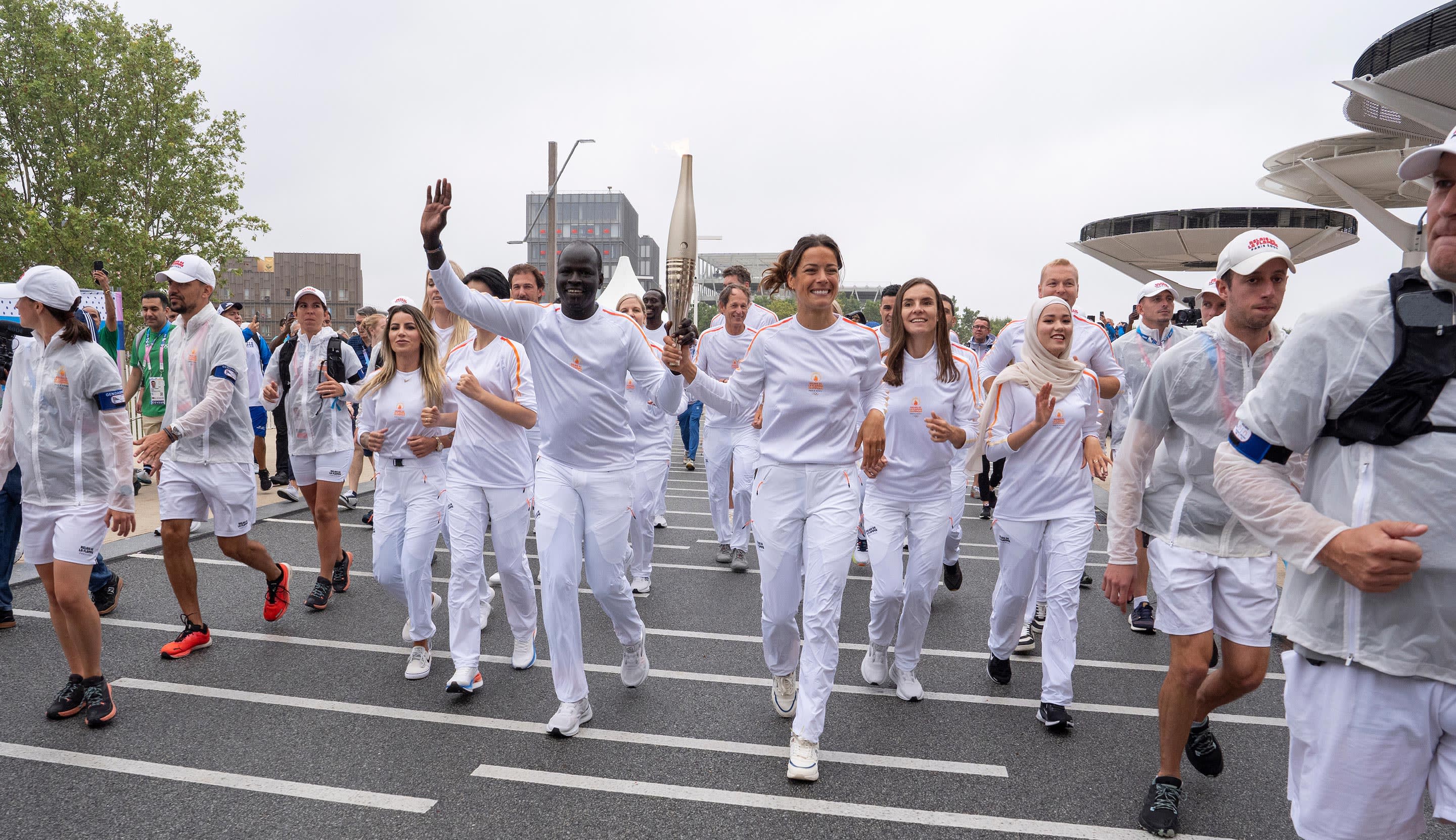 Olympians join IOC President for final leg of Olympic Torch Relay in Paris
