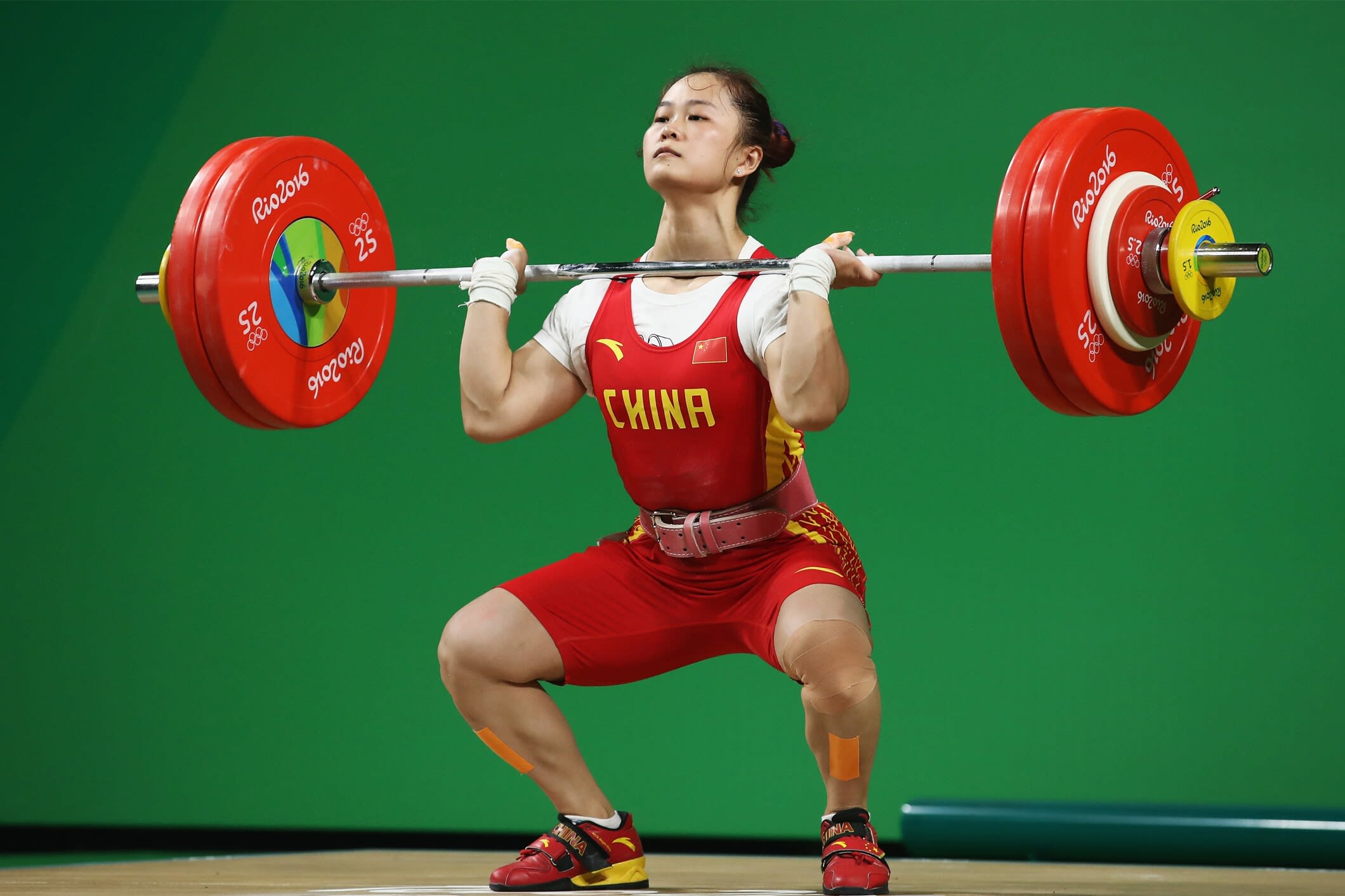 Chinese lifters post golden double as women’s 63kg records tumble ...