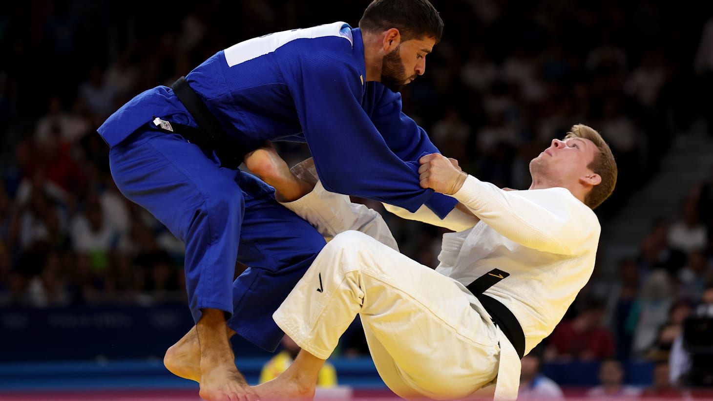 Refugee judoka Arab Sibghatullah falls to 2021 world champion Matthias ...