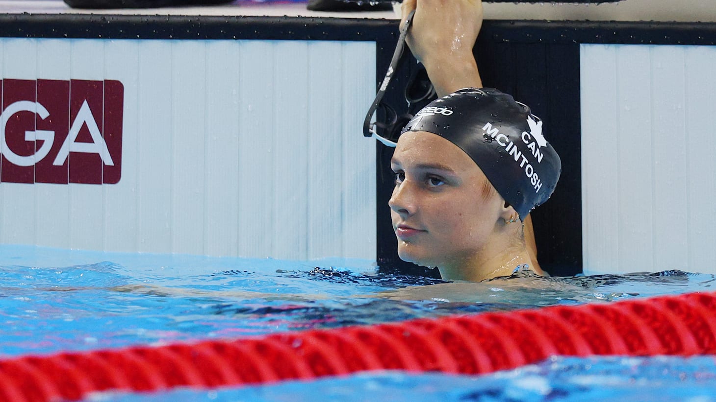 Summer McIntosh cruises to victory, while Léon Marchand wins a tight ...