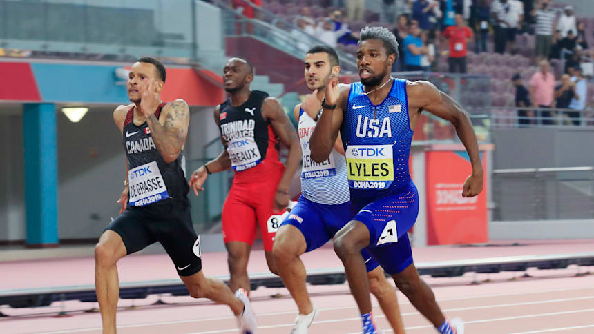 Noah Lyles claims first world title in Doha 200m