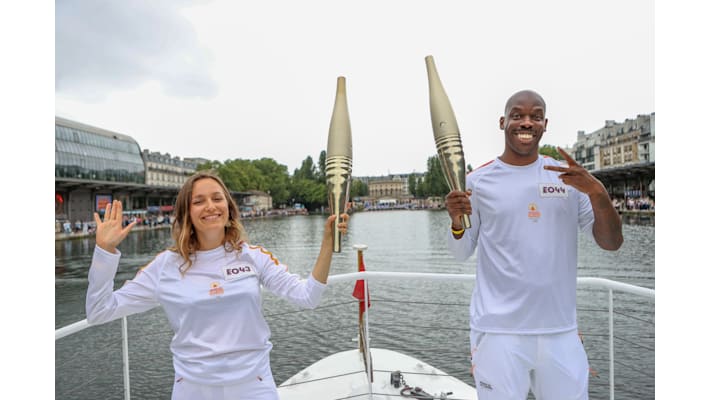The Olympic torch blazes from Saint-Denis to Paris in a spectacular ...