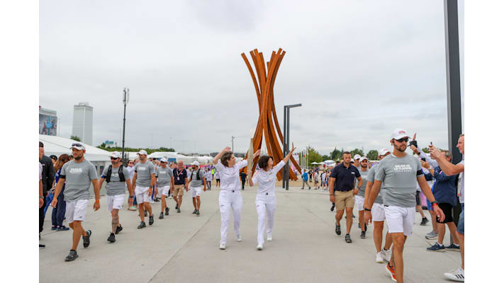 The Olympic torch blazes from Saint-Denis to Paris in a spectacular ...