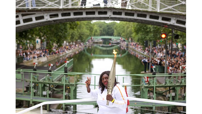 The Olympic torch blazes from Saint-Denis to Paris in a spectacular ...