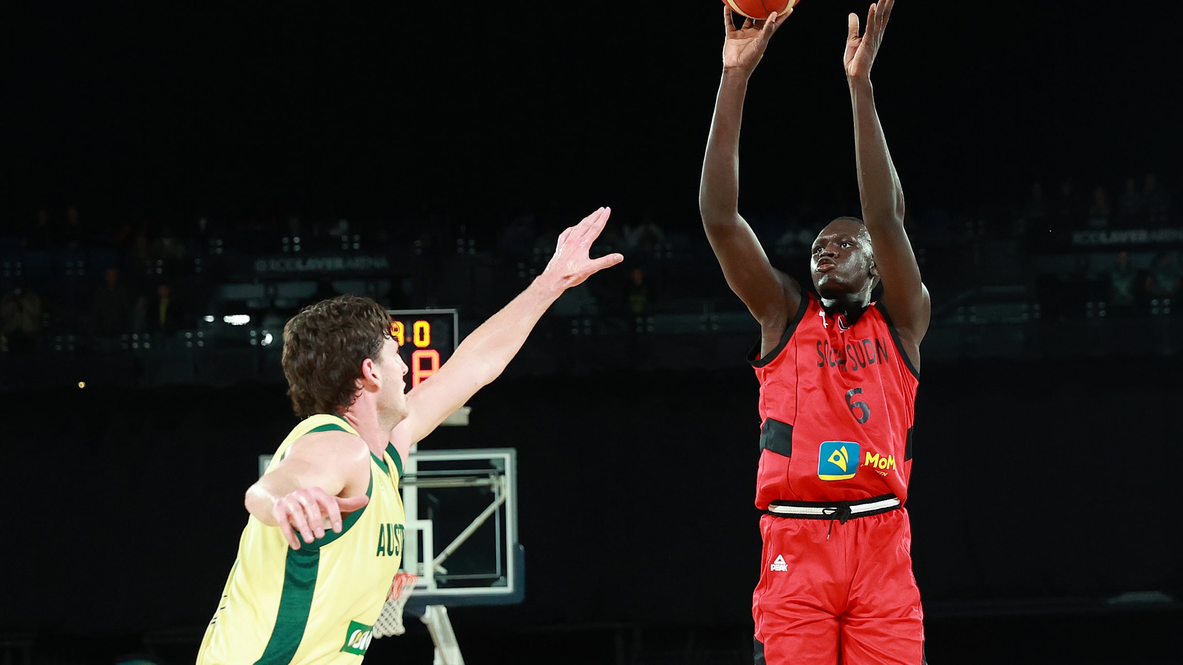 Tall Basketball Players Shooting