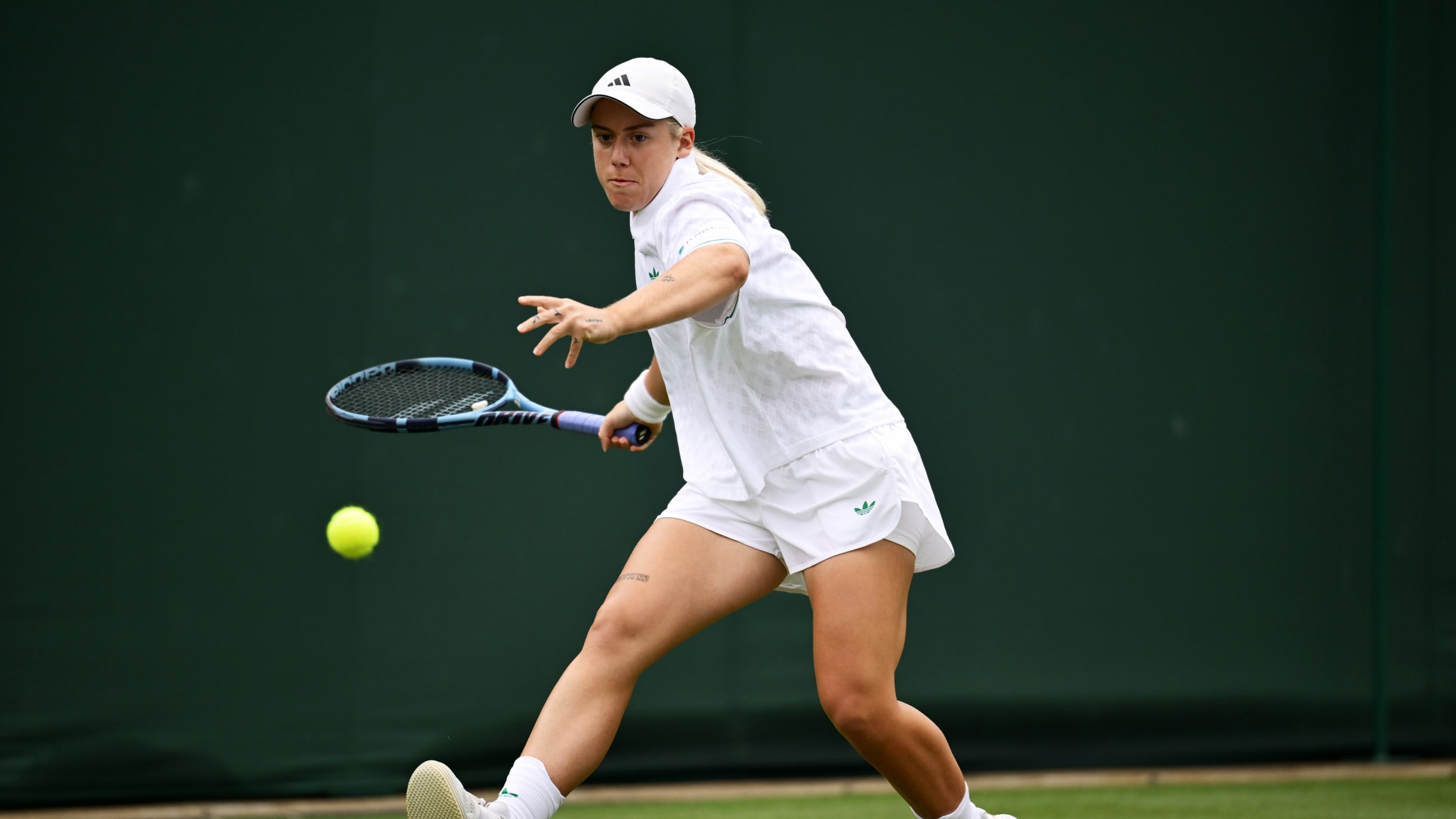 Cross Forehand Tattoos