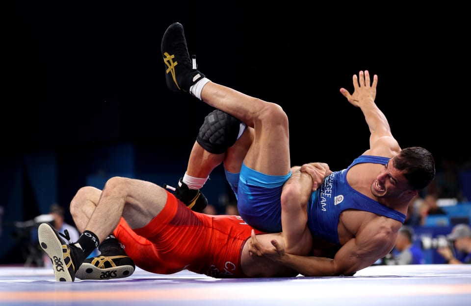 Refugee athlete Iman Mahdavi wrestles dream into reality in freestyle ...