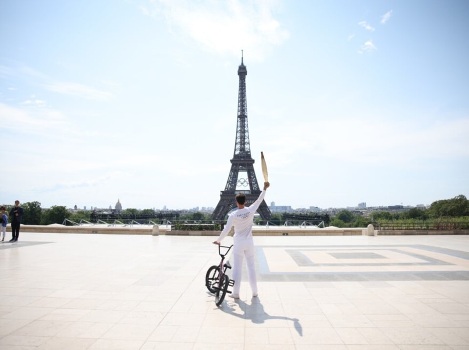 Parisians give the Olympic Torch Relay a historic welcome with the ...