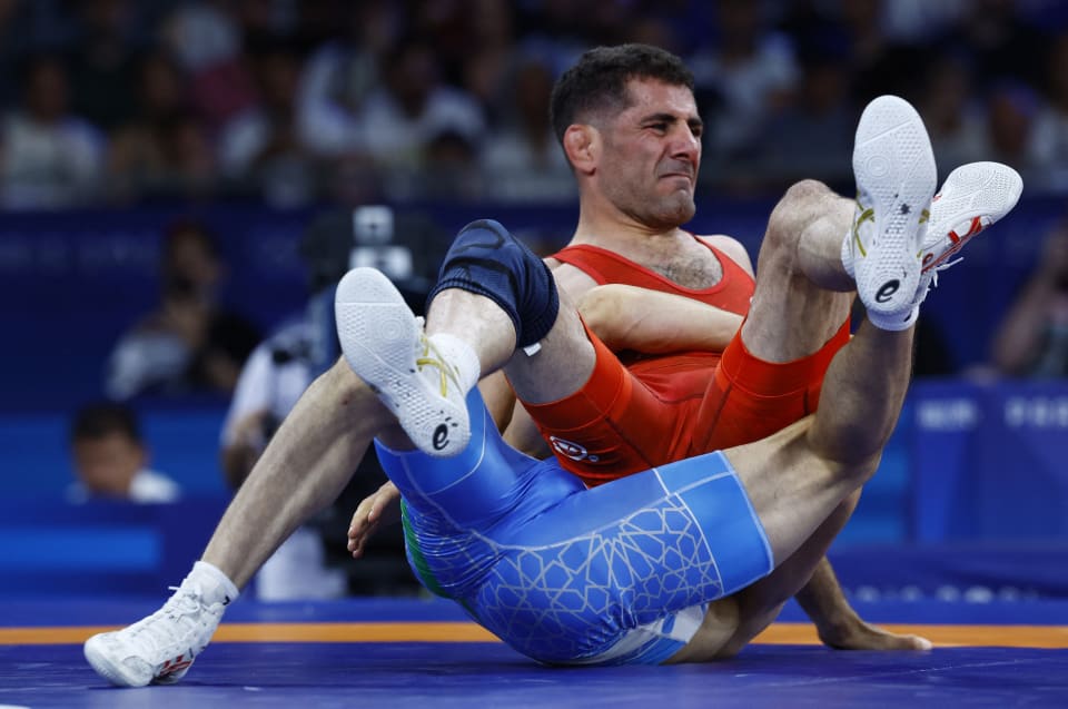 Refugee Jamal Valizadeh does his family of wrestlers proud in Greco ...