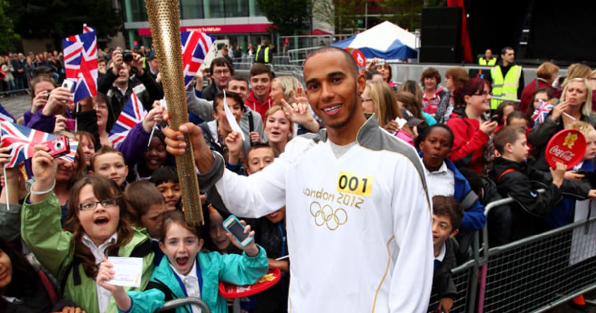 F1 star puts Olympic Flame in pole position - Olympic News