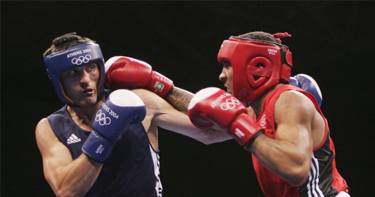 Ward honours father with boxing gold - Olympic News
