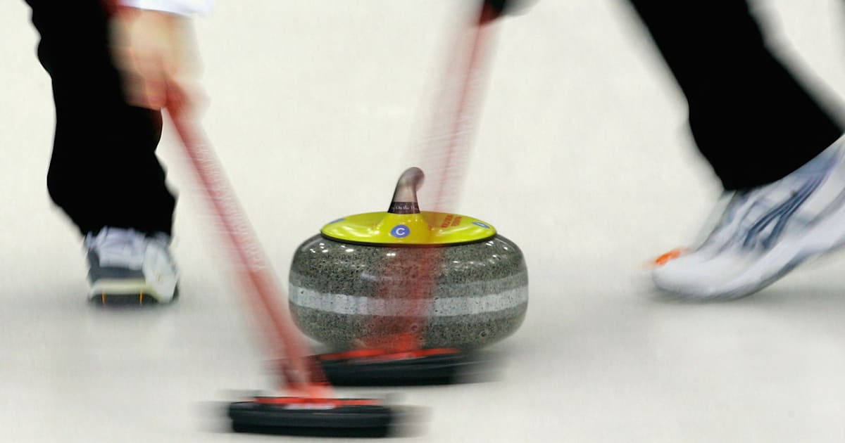 Why do athletes sweep the ice in curling?