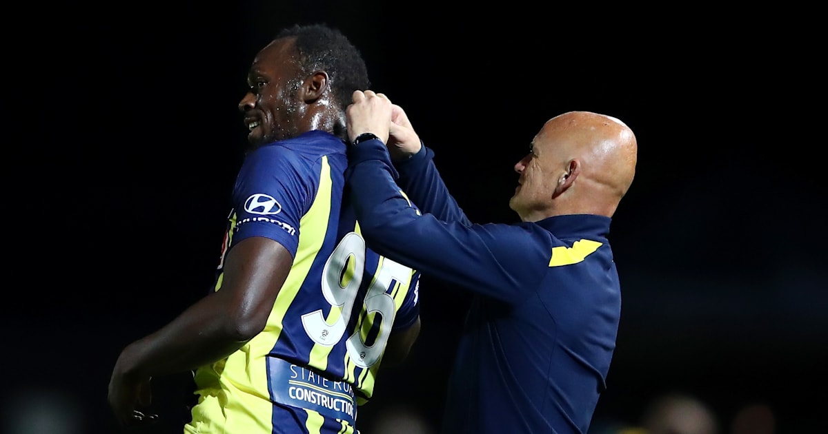 Bolt's football debut in pictures