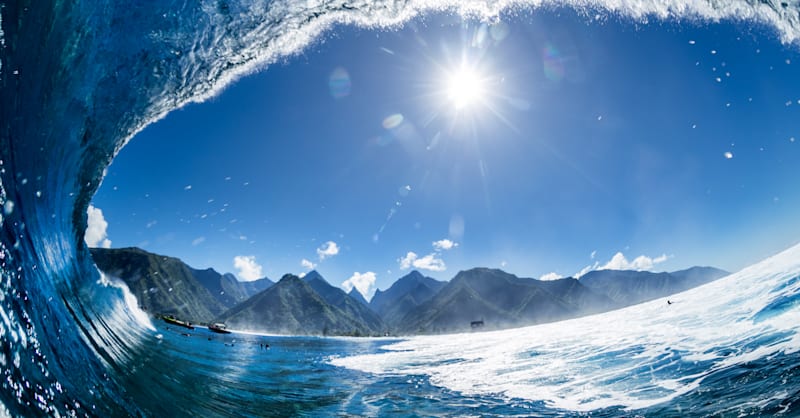 Surfing Tahiti